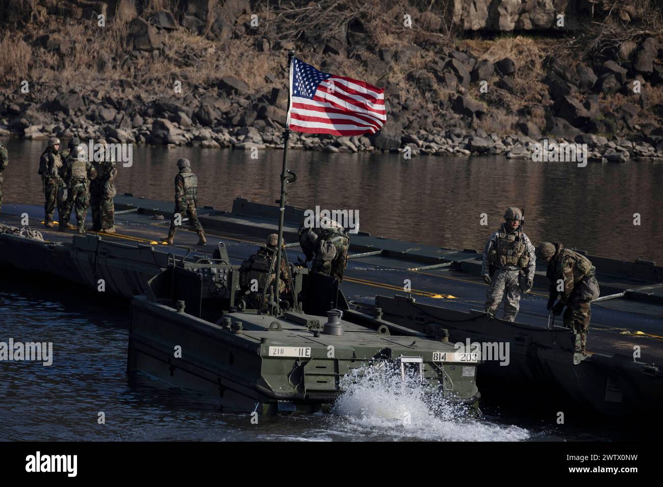 U.S. soldiers from the 11th Engineer Battalion and 2nd Infantry ...