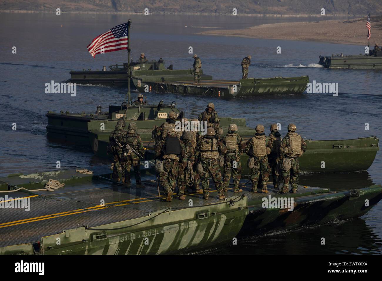 U.S. soldiers from the 11th Engineer Battalion and 2nd Infantry ...