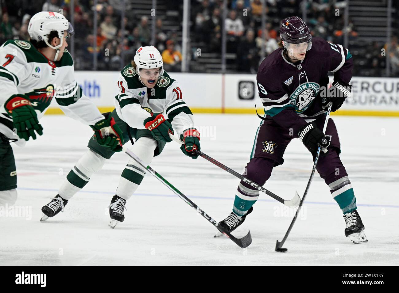 Anaheim Ducks right wing Troy Terry (19) passes the puck away from ...