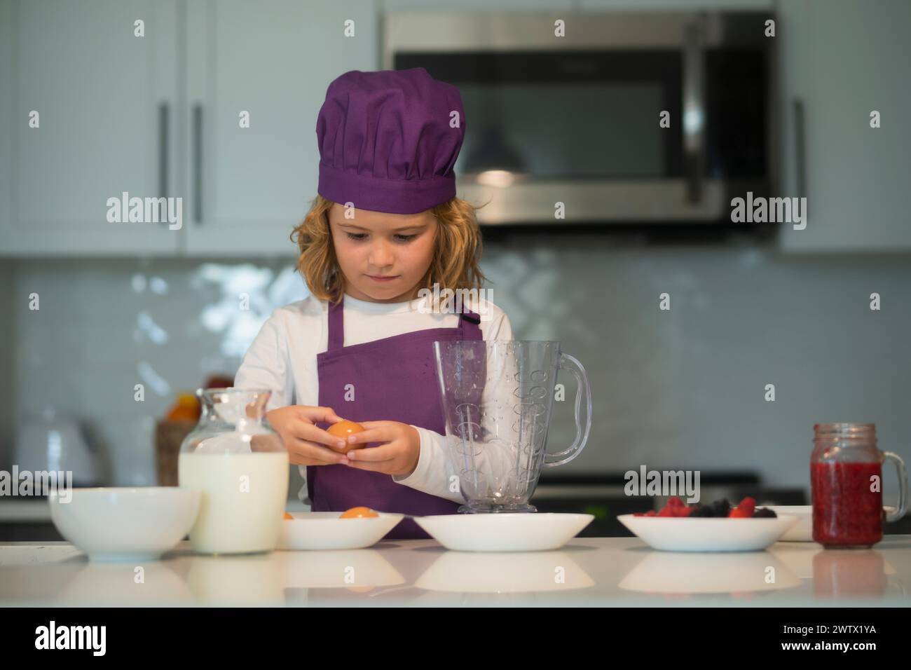 Cooking child. Child chef preparing healthy meal. Cute kid boy in chef ...