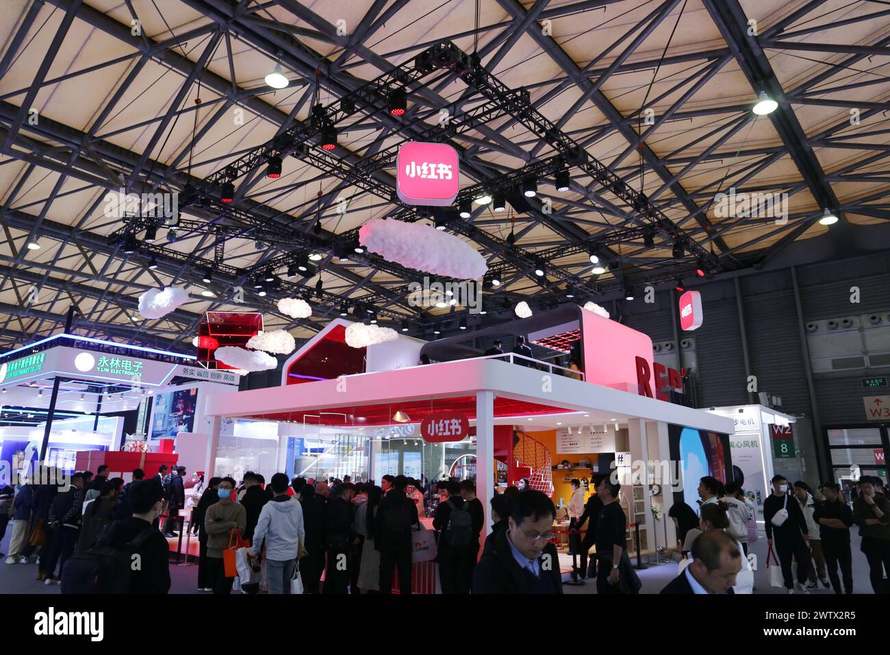 Shanghai, China. 20th Mar, 2024. Visitors are visiting the stand of Little Red Book (known as ...