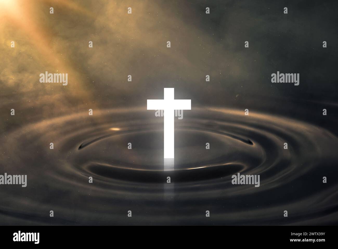 Religious cross of Jesus Christ on a water surface with sunbeam liaght ...