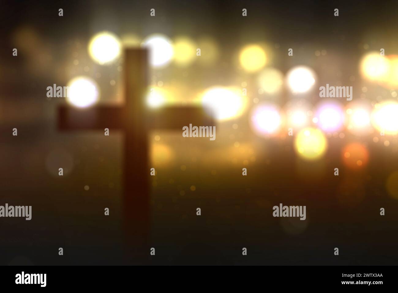 Closeup view of a Christian cross with a blurred light background ...