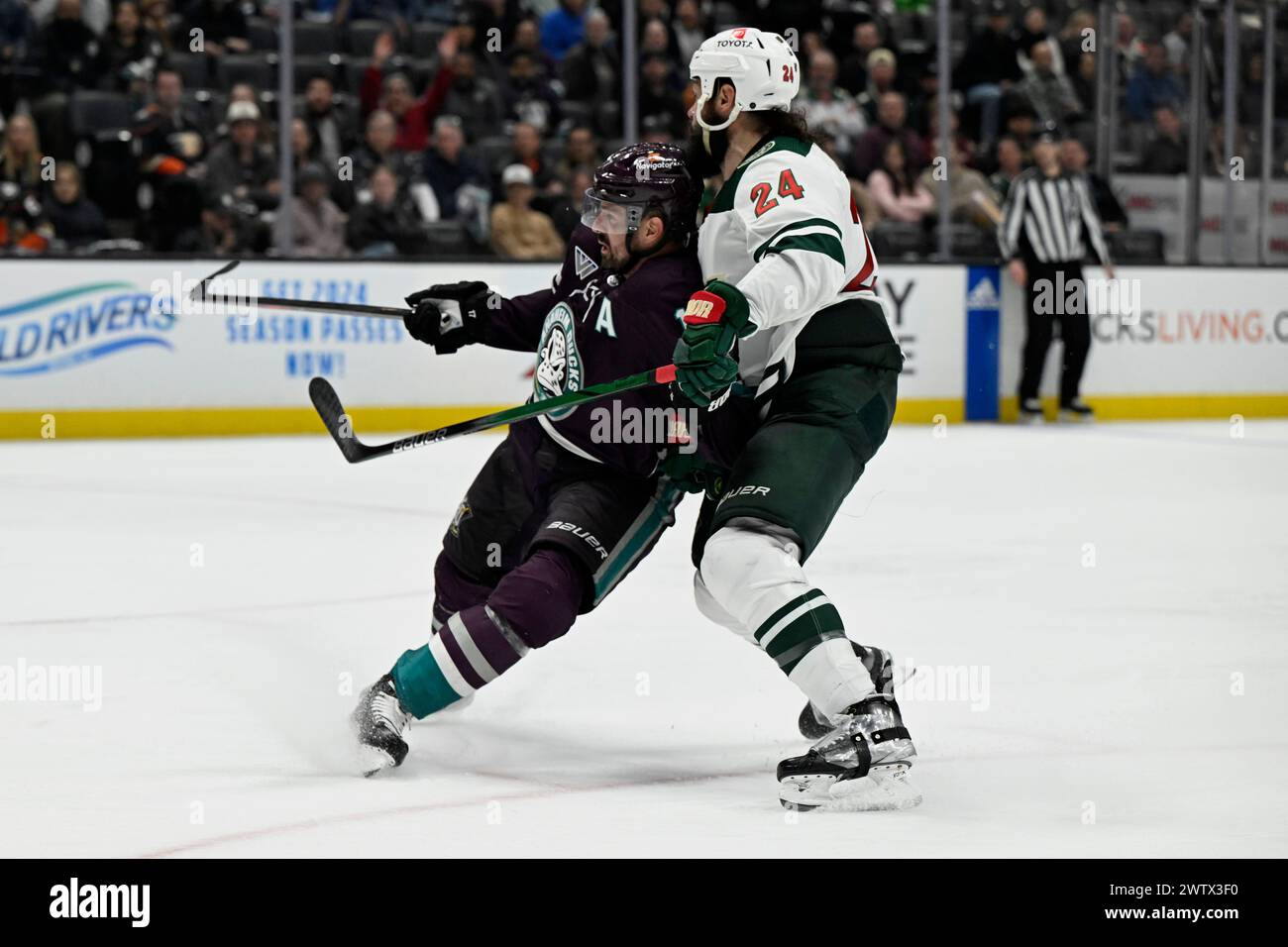Anaheim Ducks left wing Alex Killorn, left, skates with Minnesota Wild ...