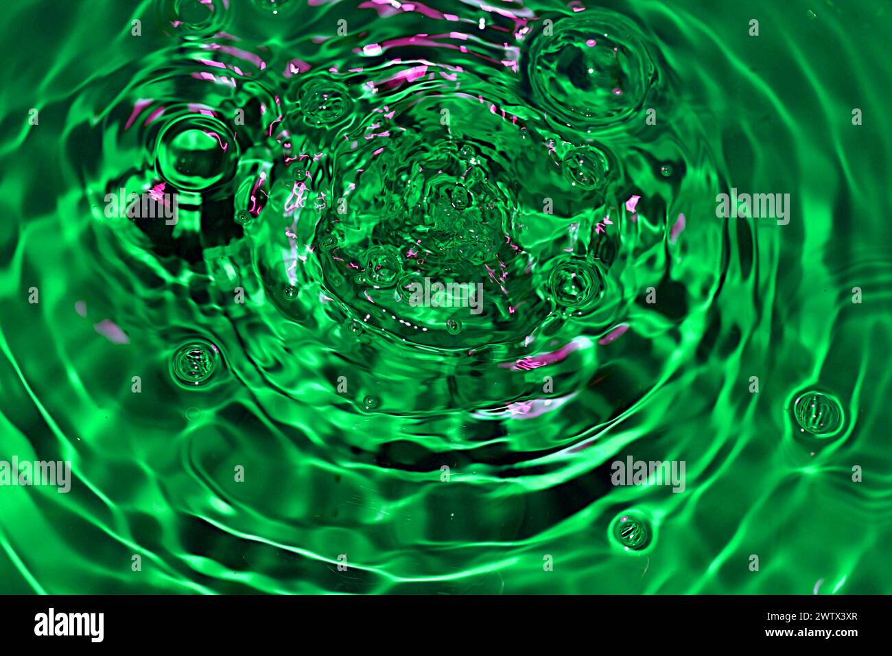 Water droplet falling into pond hi-res stock photography and images - Alamy