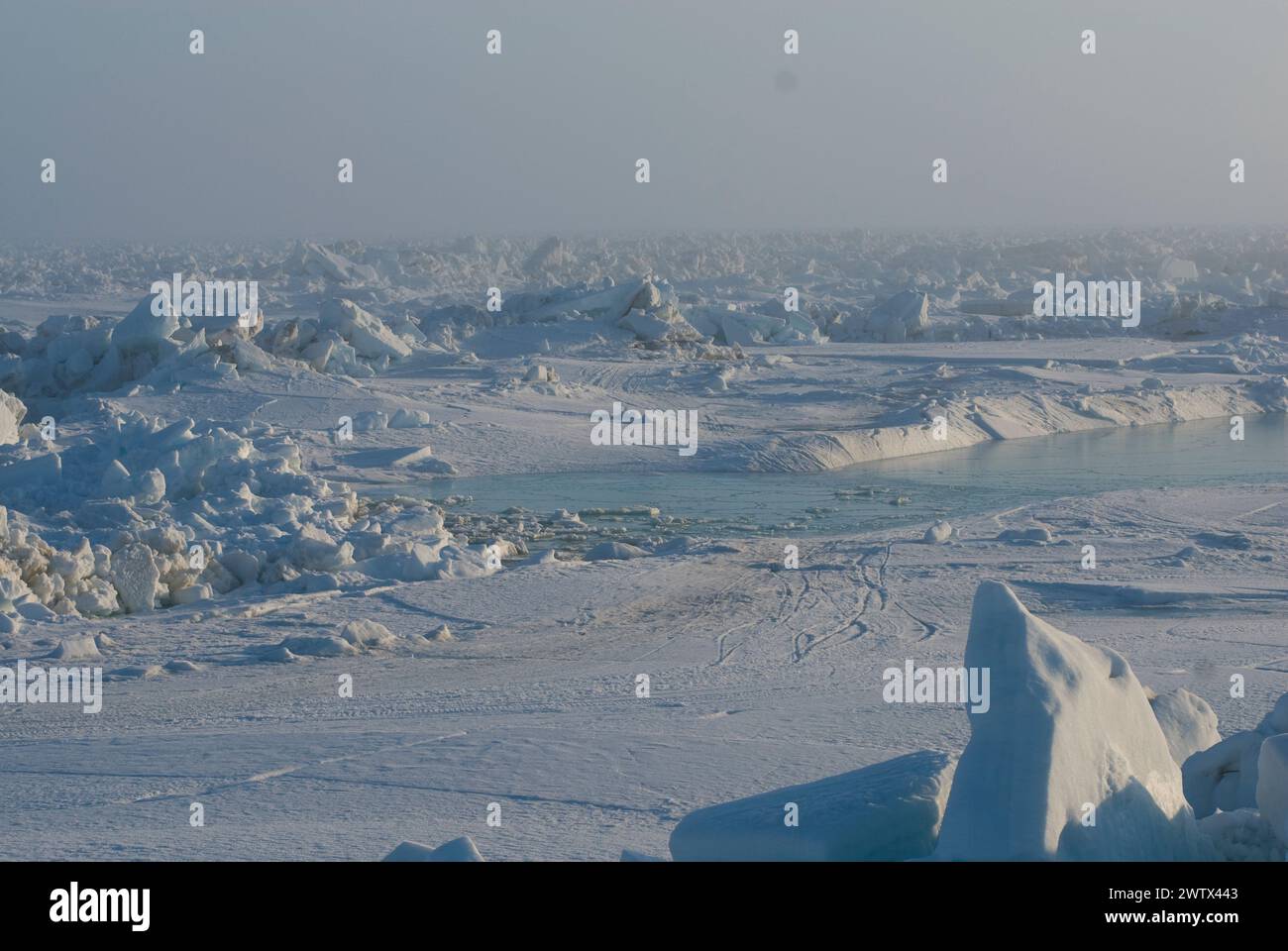 Seascape of rough trail pack ice over the Chukchi sea in springtime ...