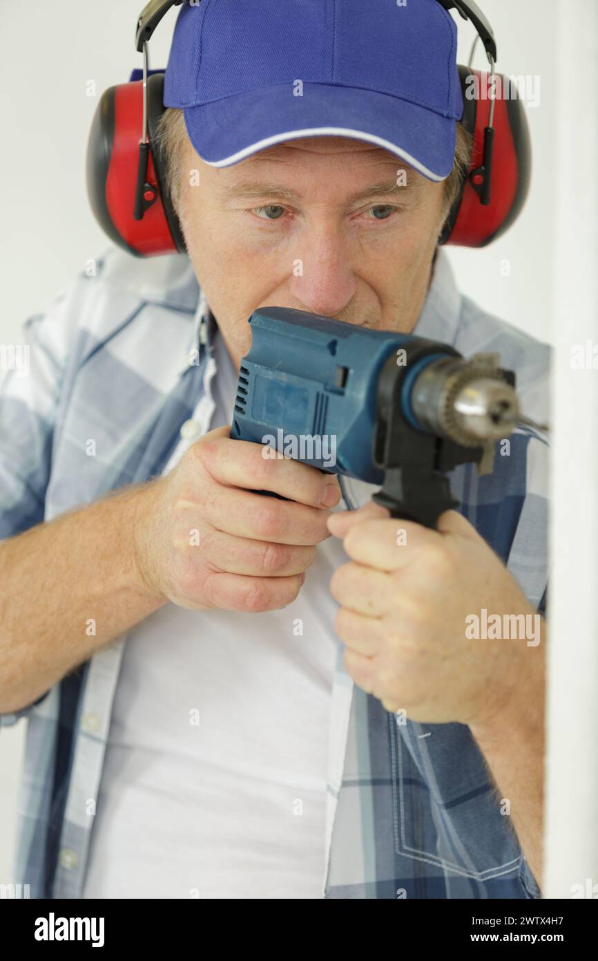 construction site workers drilling with a machine or dri Stock Photo ...