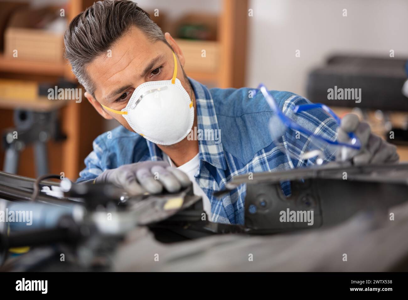 Masking manufacturing hi-res stock photography and images - Alamy