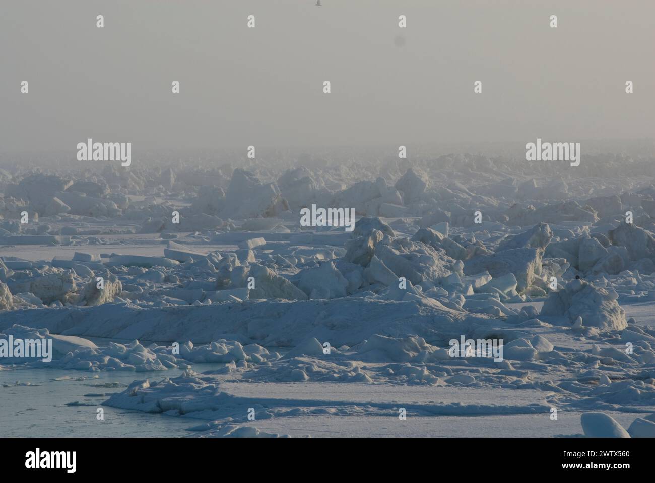 Seascape of rough trail pack ice over the Chukchi sea in springtime ...