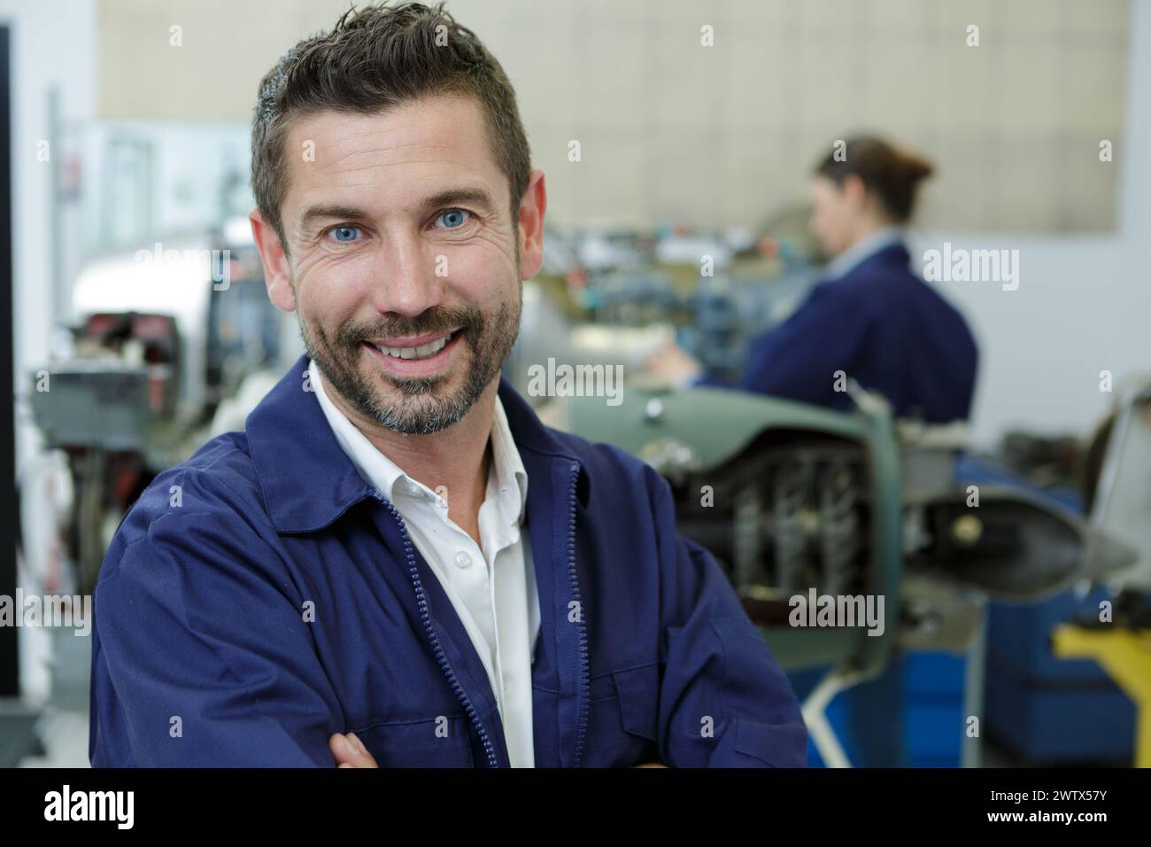 a portrait of an aircraft mechanic posing Stock Photo - Alamy