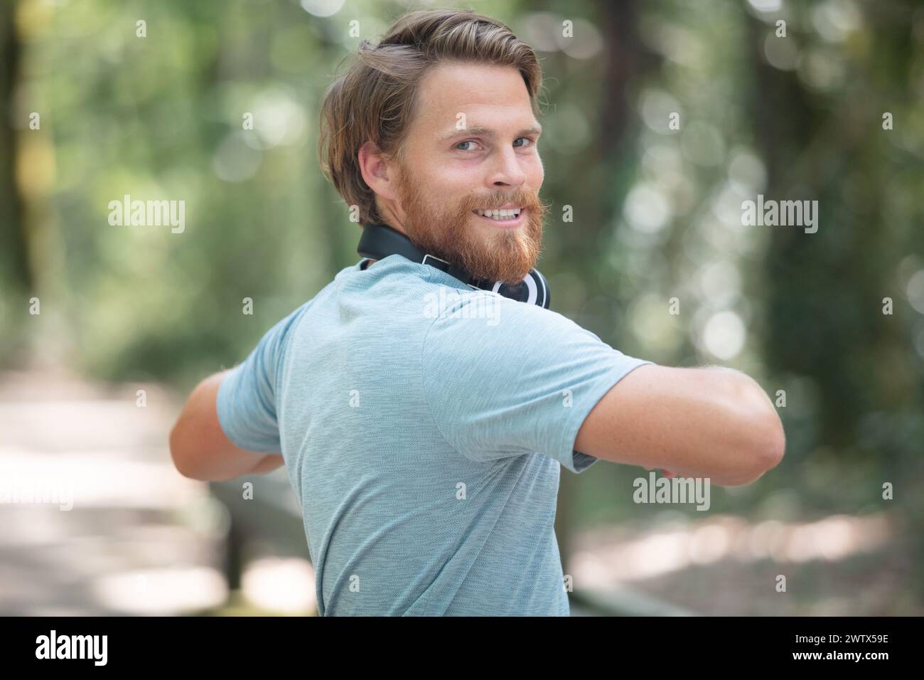 running man stretching before run Stock Photo - Alamy