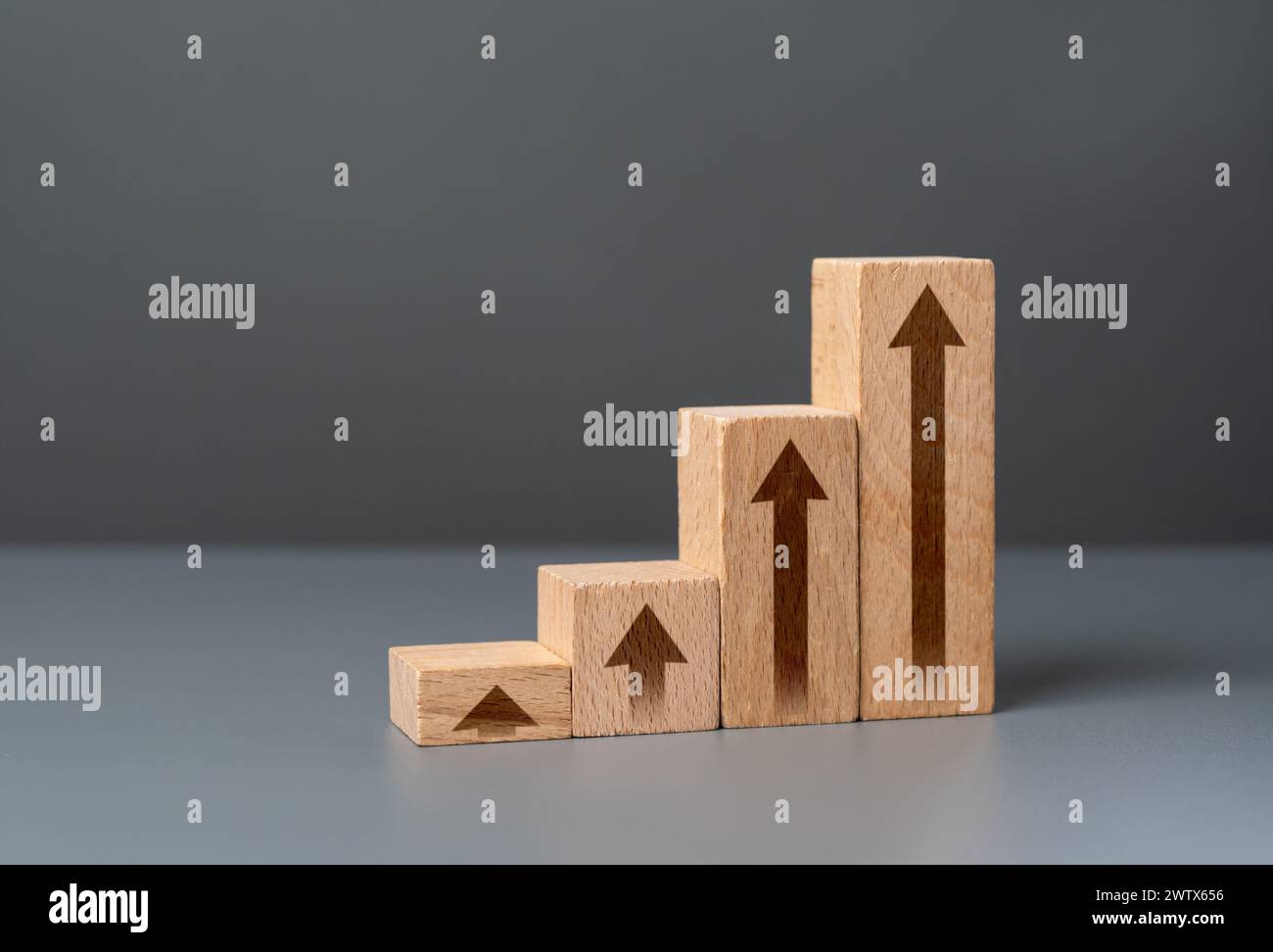 Growth chart made from wooden blocks. Growth and development, promotion ...