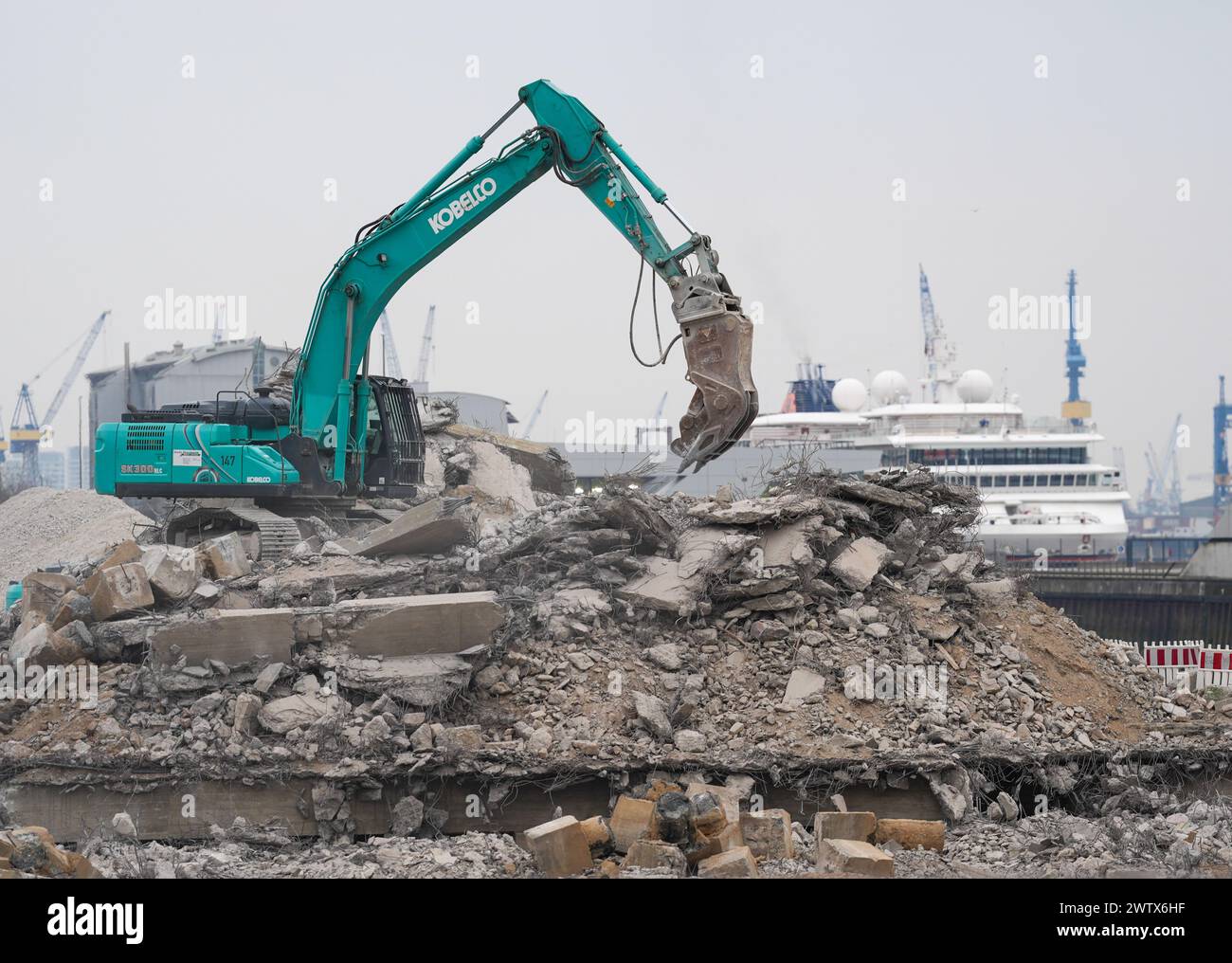 Hamburg, Germany. 20th Mar, 2024. An excavator removes rubble during ...