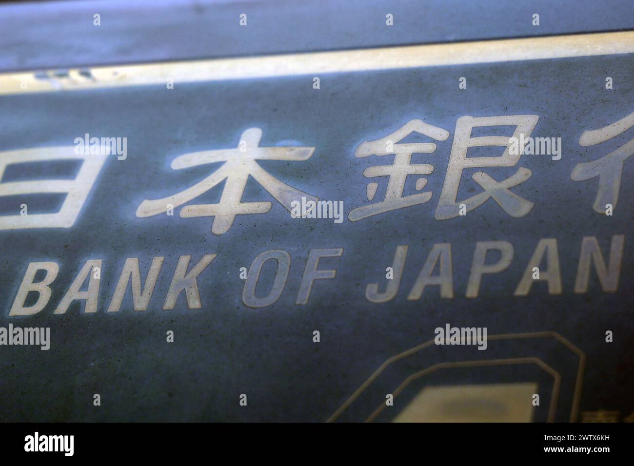 Tokyo, Japan. 19th Mar, 2024. A signboard of the Bank of Japan (BOJ) is ...