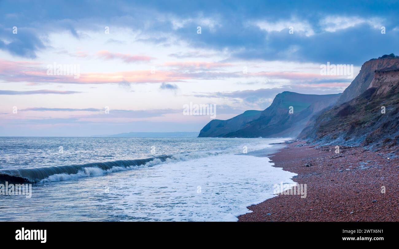 Dawn at Eype beach on the Dorset Jurassic coast south west England UK ...