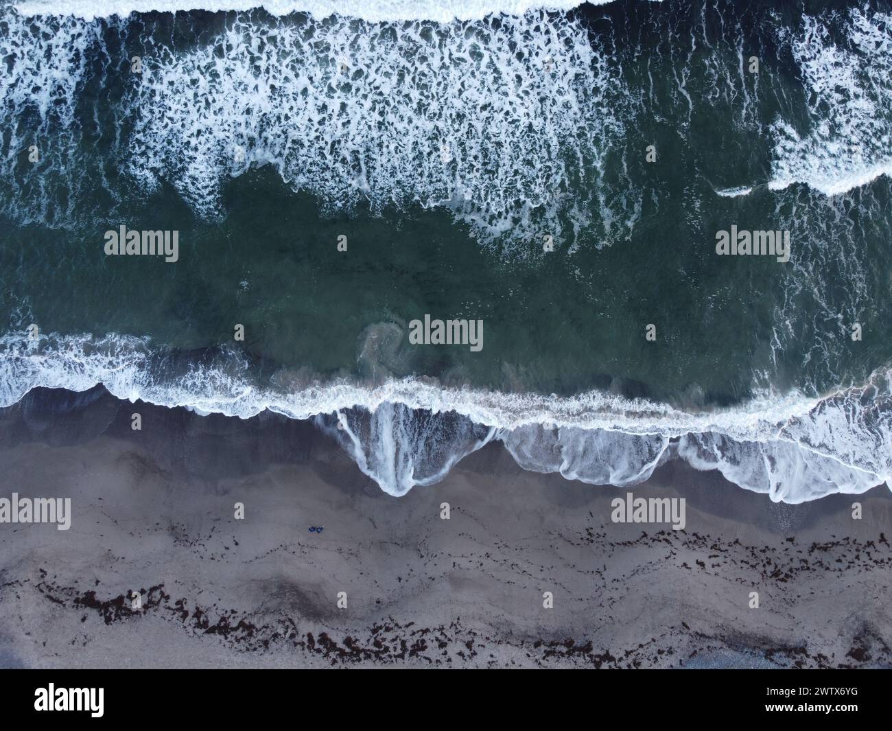 An aerial view of water and beach area Stock Photo - Alamy