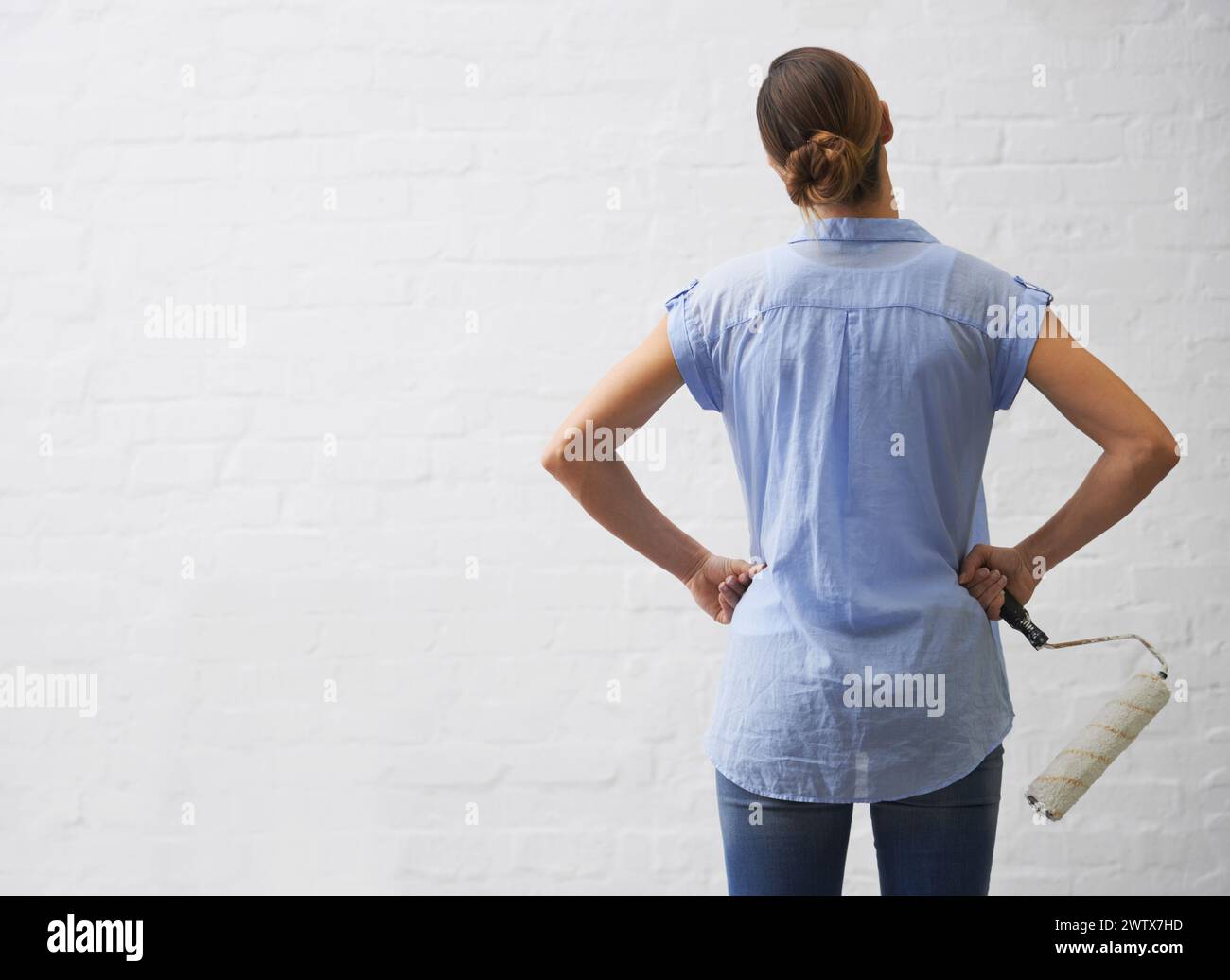Paint, wall and woman in home with renovation creative project and ...