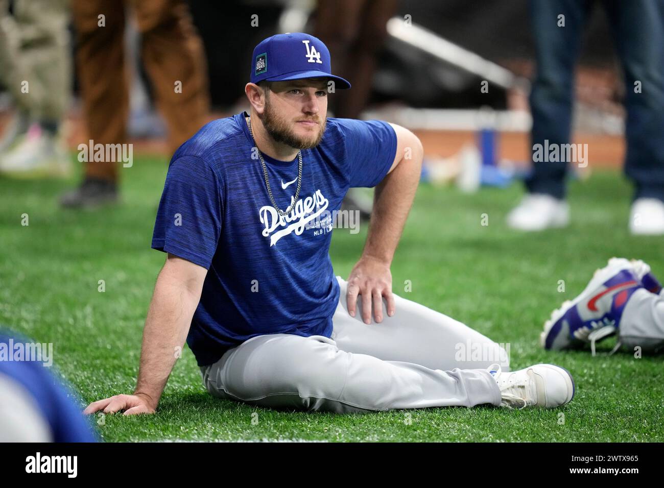 Los Angeles Dodgers' Max Muncy warms up prior to an opening day ...