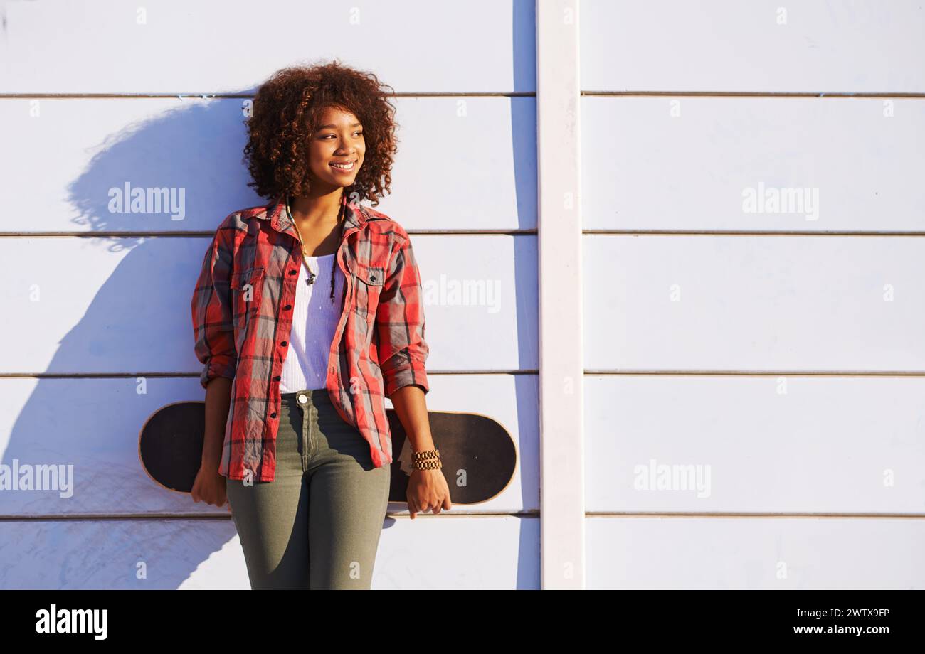 Skateboard, fashion and black woman in skatepark for exercise, training ...