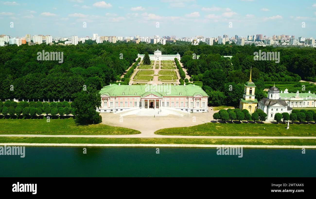 Palace with pond on background of modern city. Creative. Top view of ...