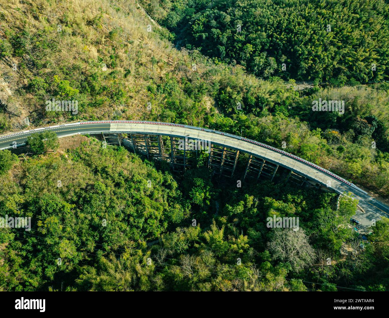 aerial top view above Huai Tong Bridge. Forest River Bridge under a ...