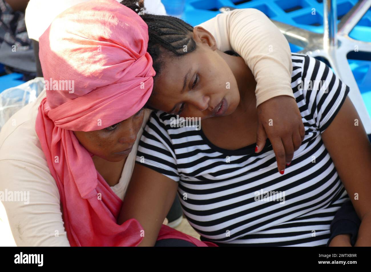 Survivors, mostly from Eritrea, breathe a sigh of relief after being ...