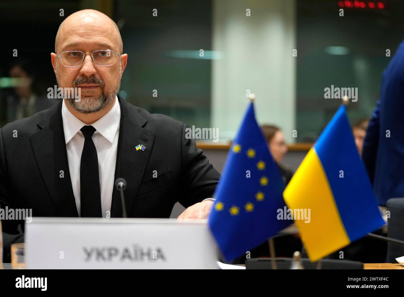 Ukraine's Prime Minister Denys Shmyhal waits for the start of a ...