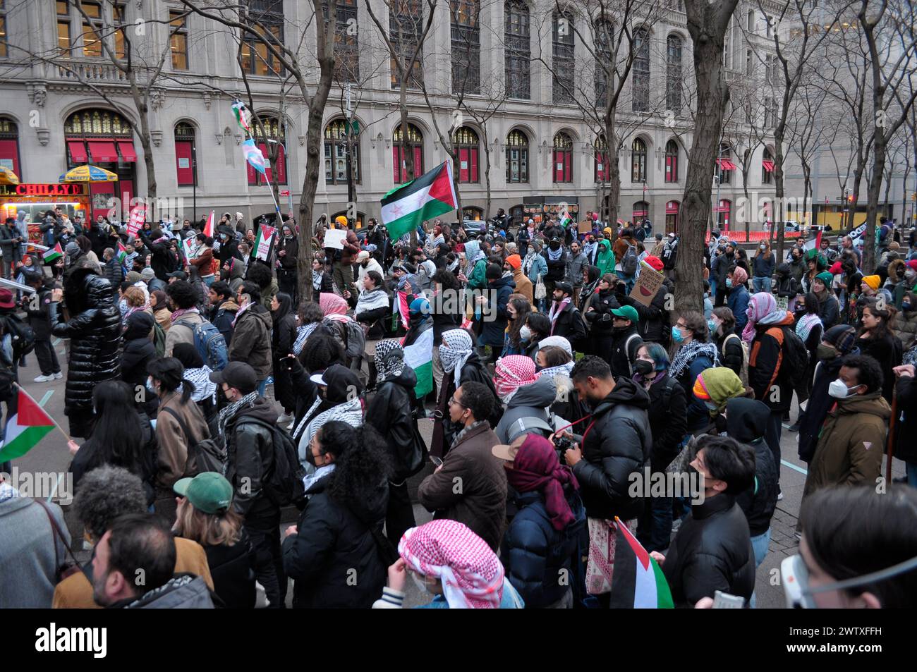 Pro-Palestine demonstrators rally waving Palestinian flags and chanting ...