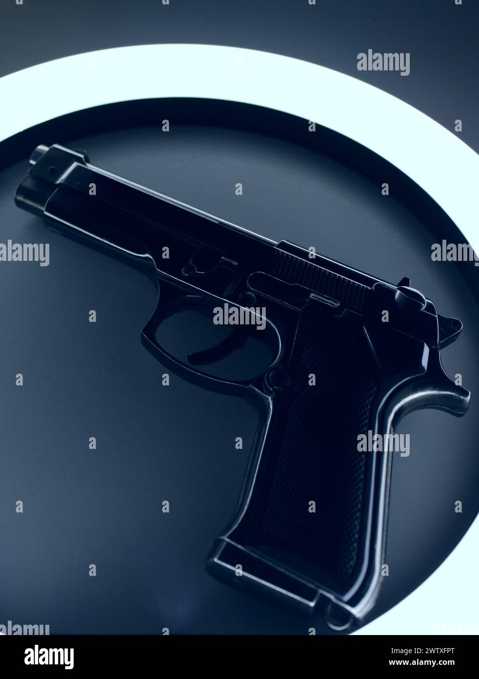 Contour Of Black Metal Pistol Gun On White Surface With Blue Backlight ...