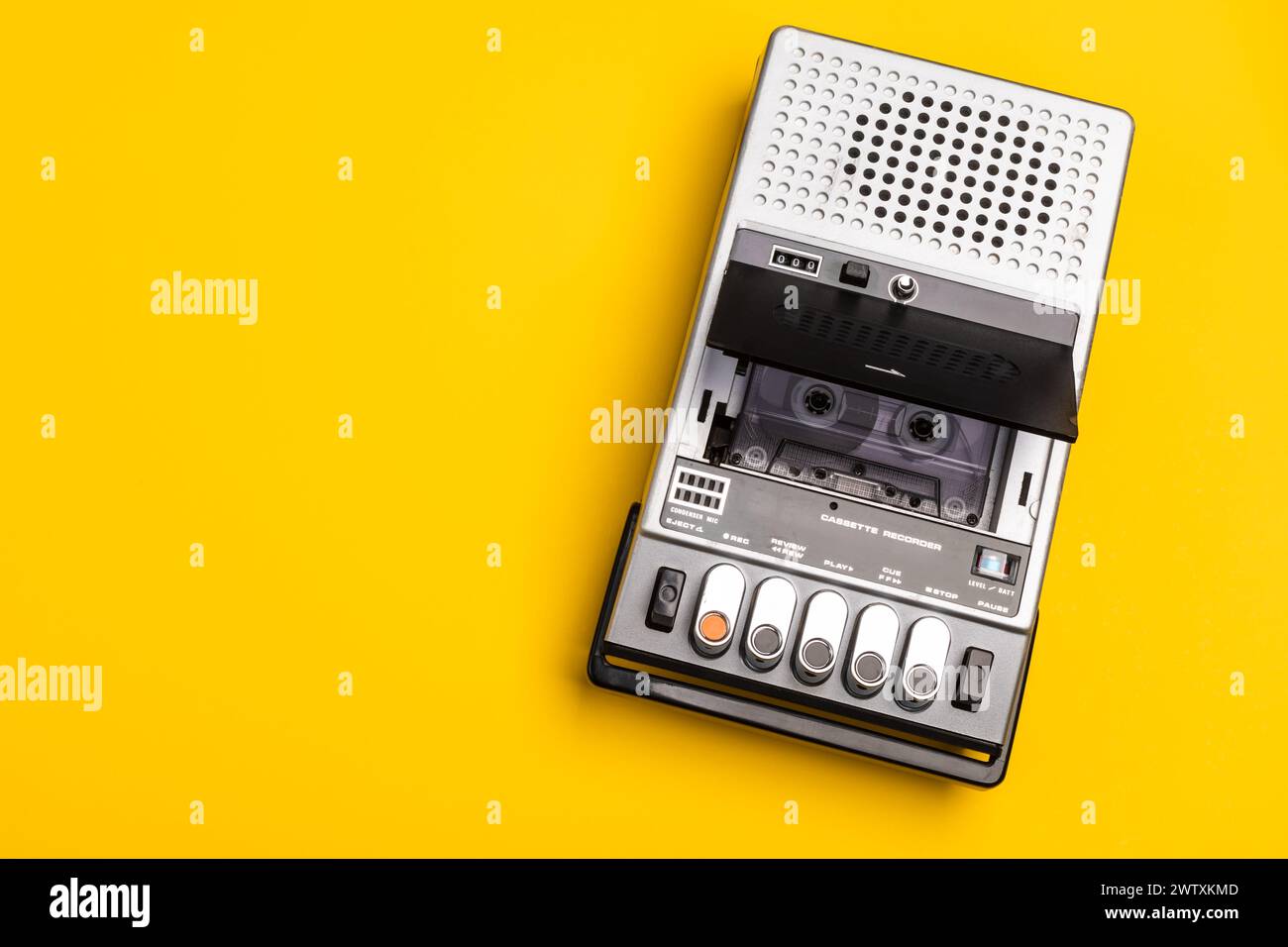 VIntage portable tape recorder with open cover and compact cassette ...