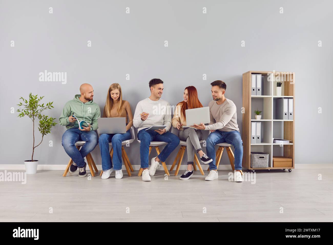 Group men work sitting hi-res stock photography and images - Alamy