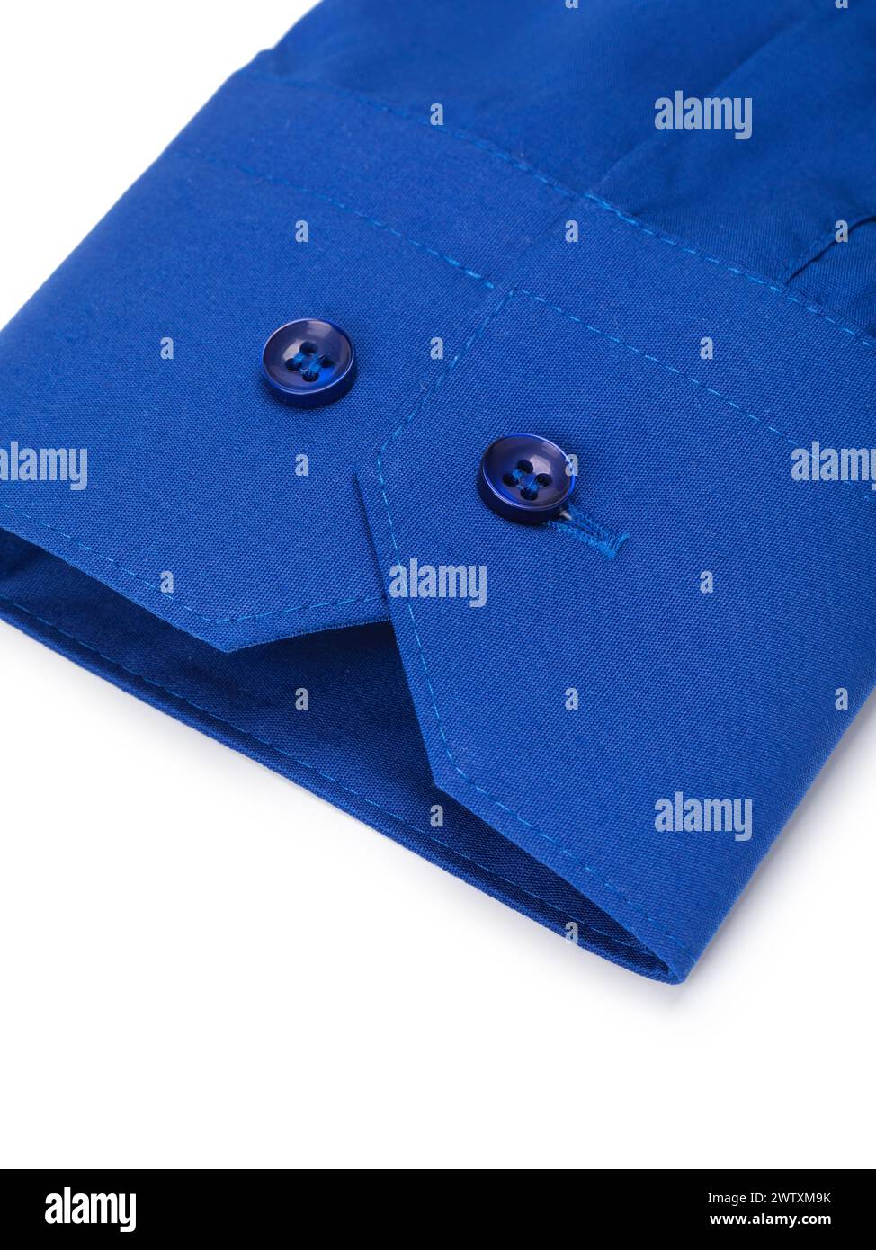 Inky blue shirt cuff with buttons on a white background close-up Stock ...