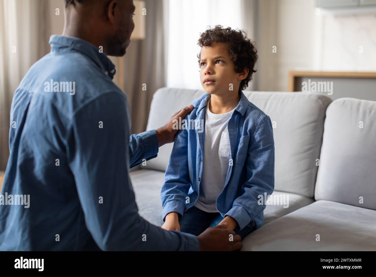 Father son serious talk boy hi-res stock photography and images - Alamy