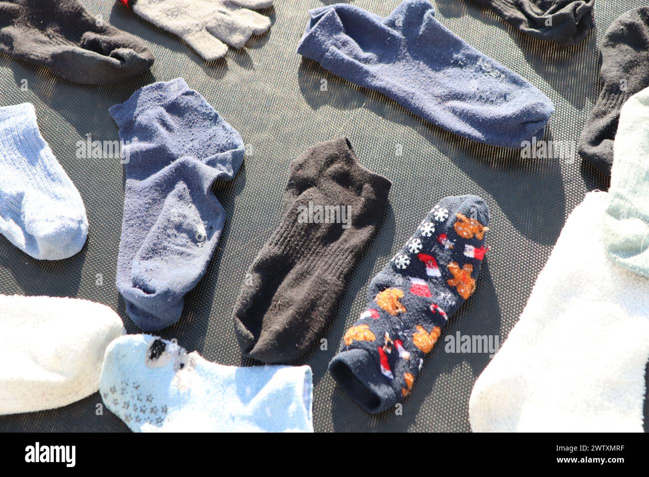 A pile of electric blue socks in plastic packaging on the table Stock ...