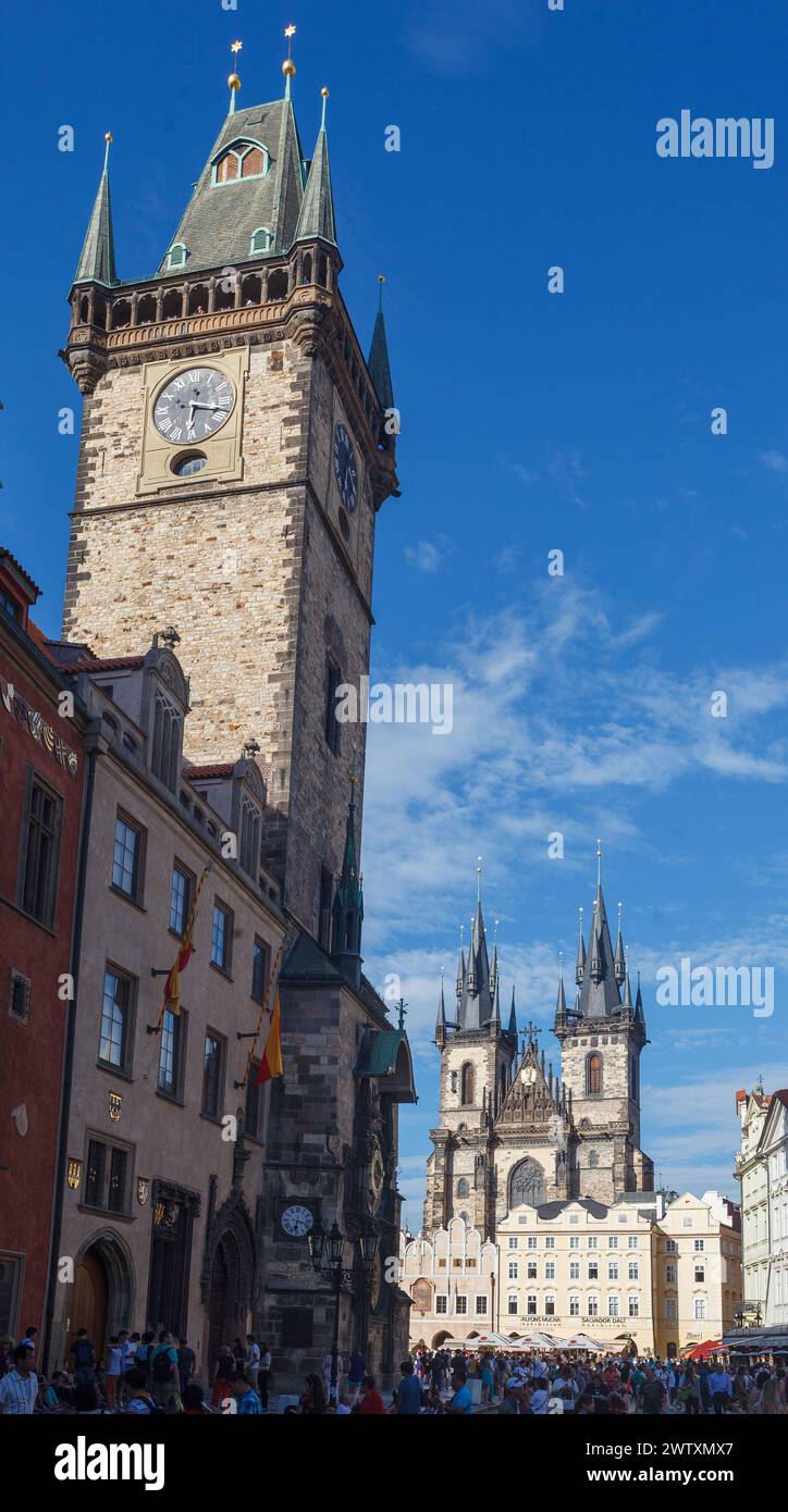Tourists visiting old town and the facade of Our Lady Before Tyn church ...