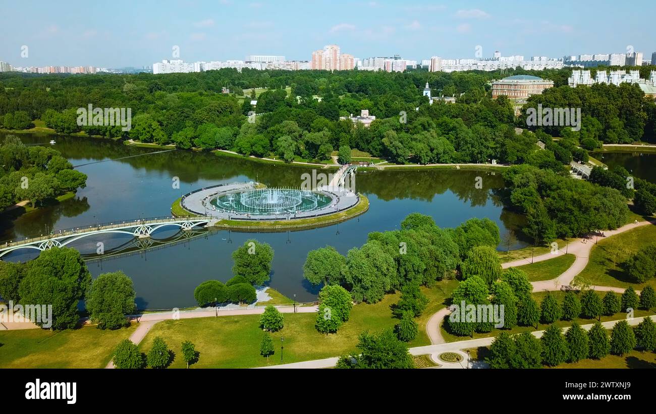 Top view of bridges in city pond with fountains. Creative. Island with ...