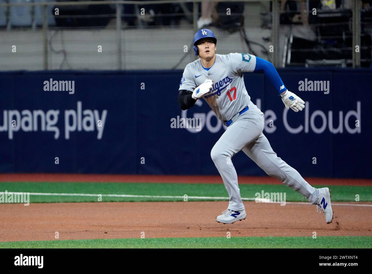 Los Angeles Dodgers designated hitter Shohei Ohtani heads to second on ...