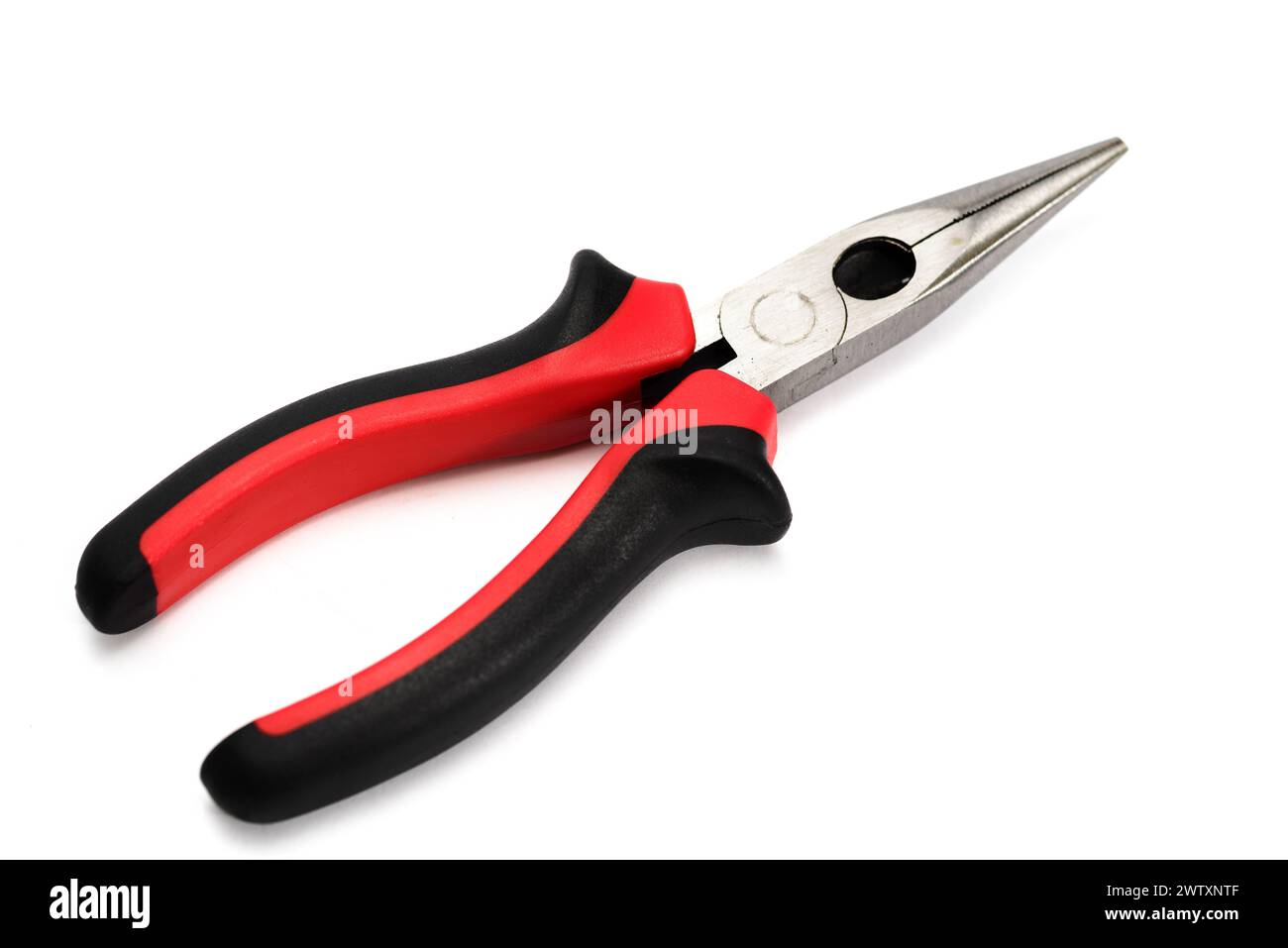 Long needle nose pliers with red plastic handle on white background ...