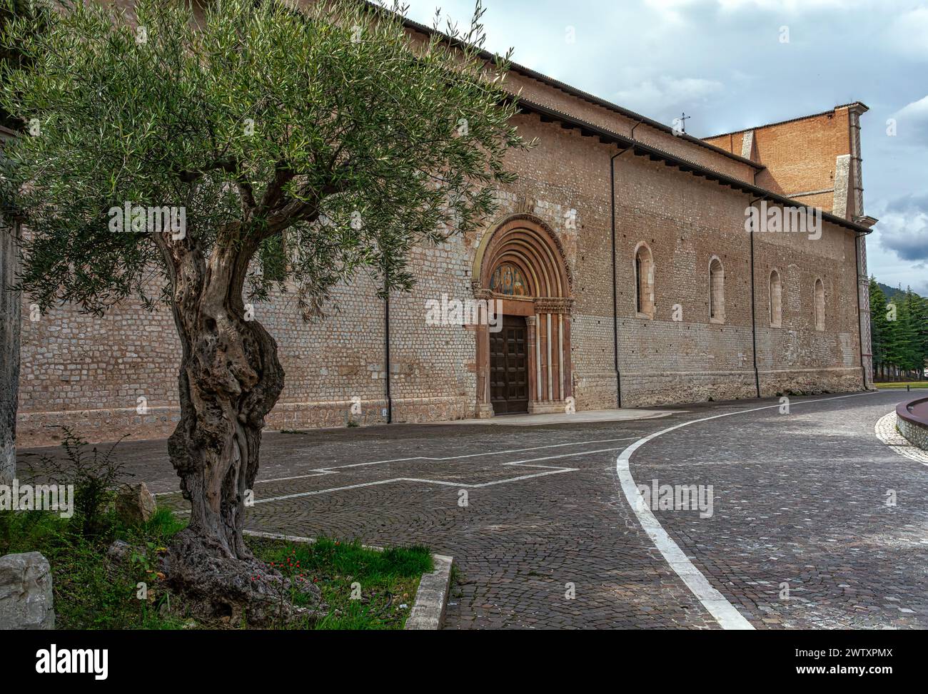 On the left wall of the Basilica of Santa Maria di Collemaggio is the ...