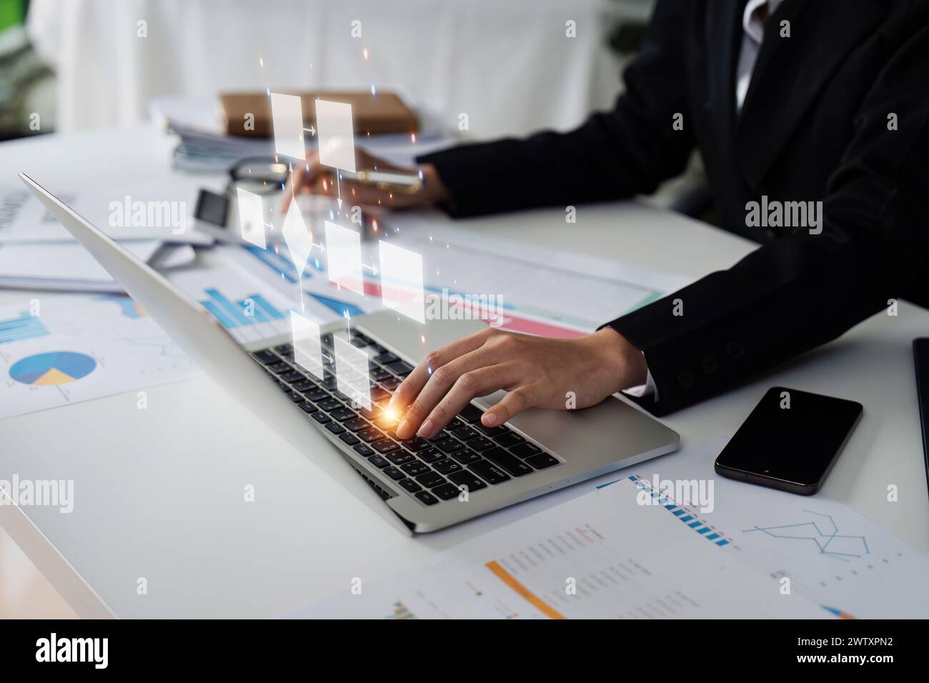 Businessman using a computer analysis for process and workflow ...