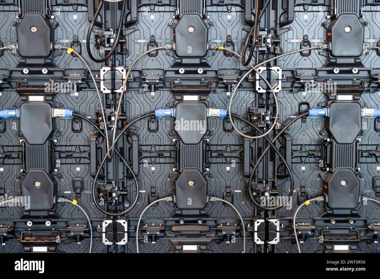 Backside of big LED screen monitor display. Texture of back view panels. Power input and output ...