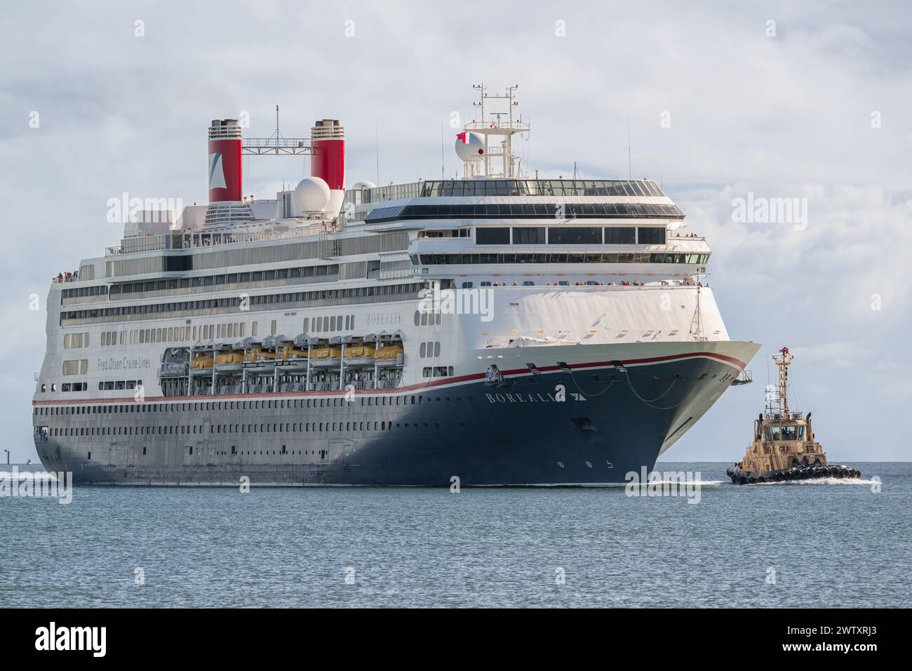 Fred Olsen Cruise Liner Borealis being escorted through theTrinity ...