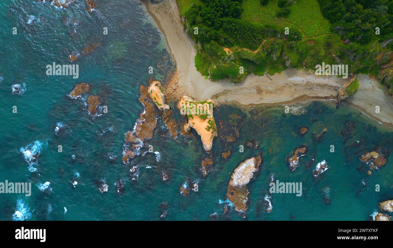 Top view of beautiful wild coast with rocks in water. Clip. Coastline ...