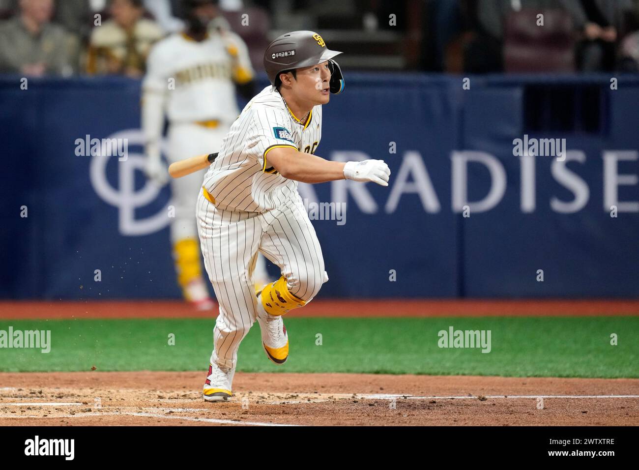 San Diego Padres' Ha-Seong Kim runs to first as he lines out during the ...