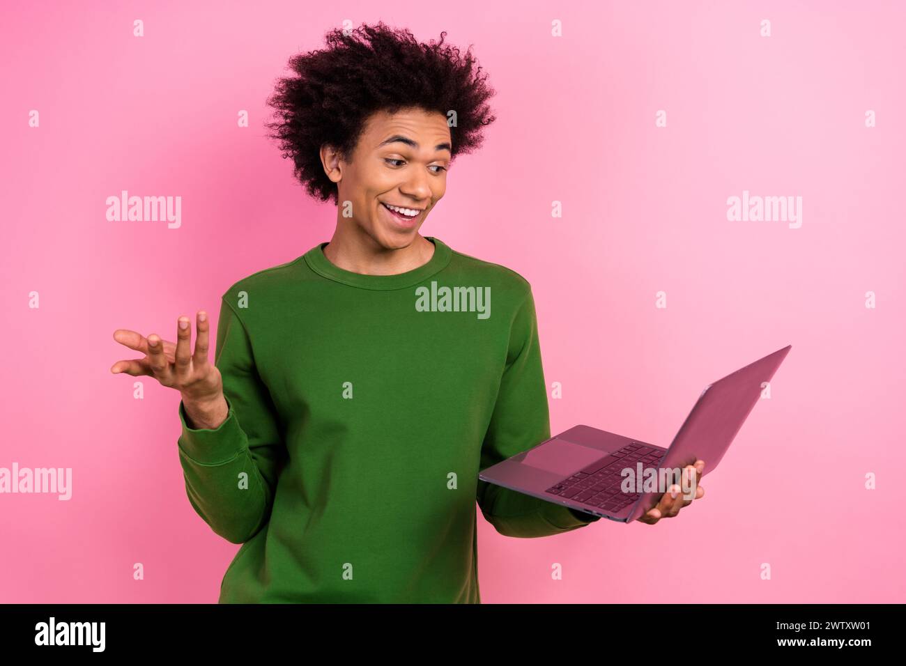 Photo of happy positive guy communicate with using netbook isolated ...