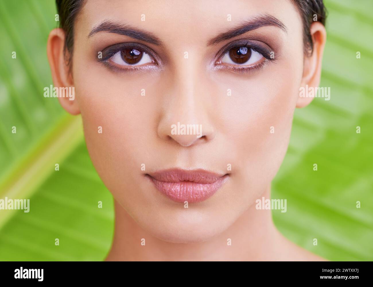 Face, woman and beauty with palm leaf background, makeup and natural ...