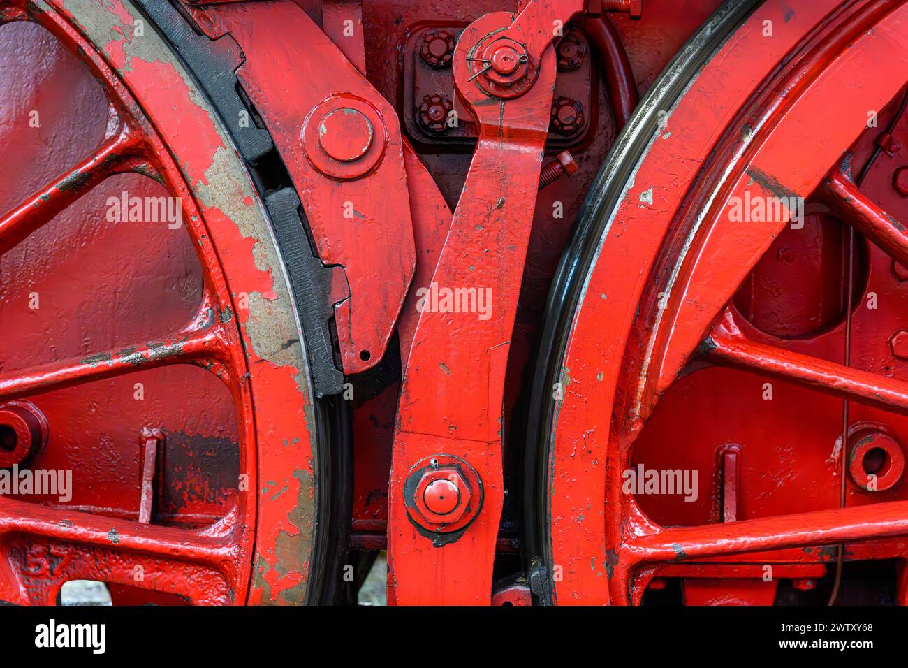 Two red wheels of an old steam locomotive with brake Stock Photo - Alamy