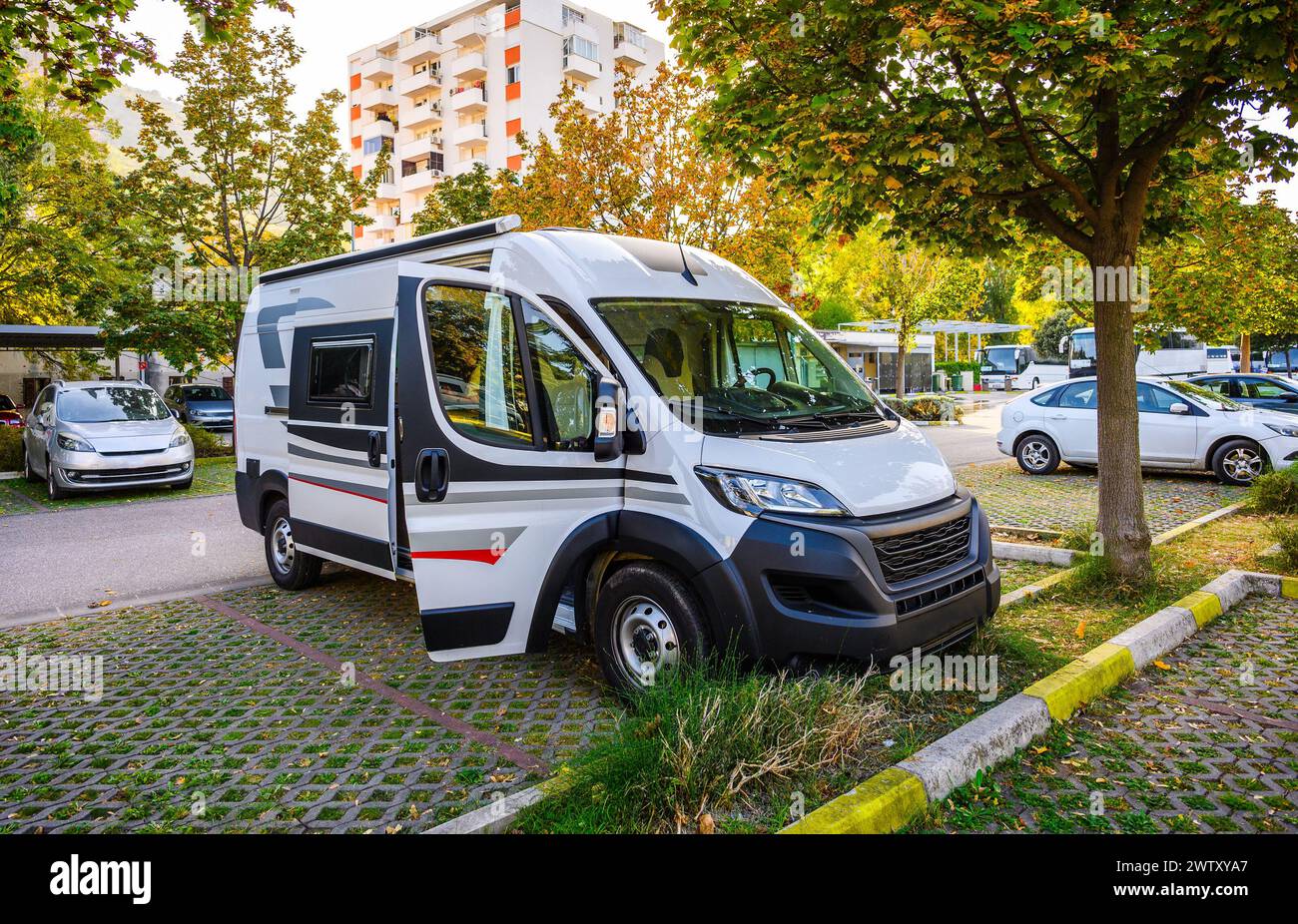 Camper van or motor home is parked in residential parking place in ...