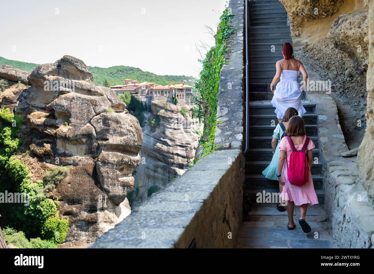 Tourist family visiting Meteora monastery in Greece. Family with kids ...