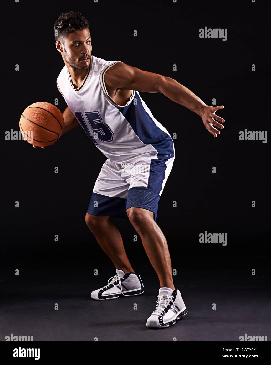 Man, sport and basketball player in studio for fitness, competition and ...